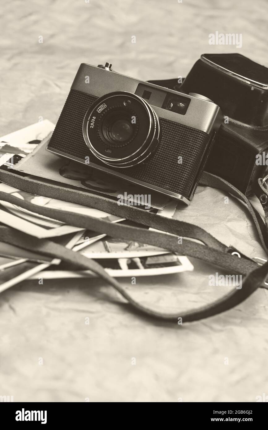 Vintage film camera on crumpled paper background. FED Mikron-2 ...