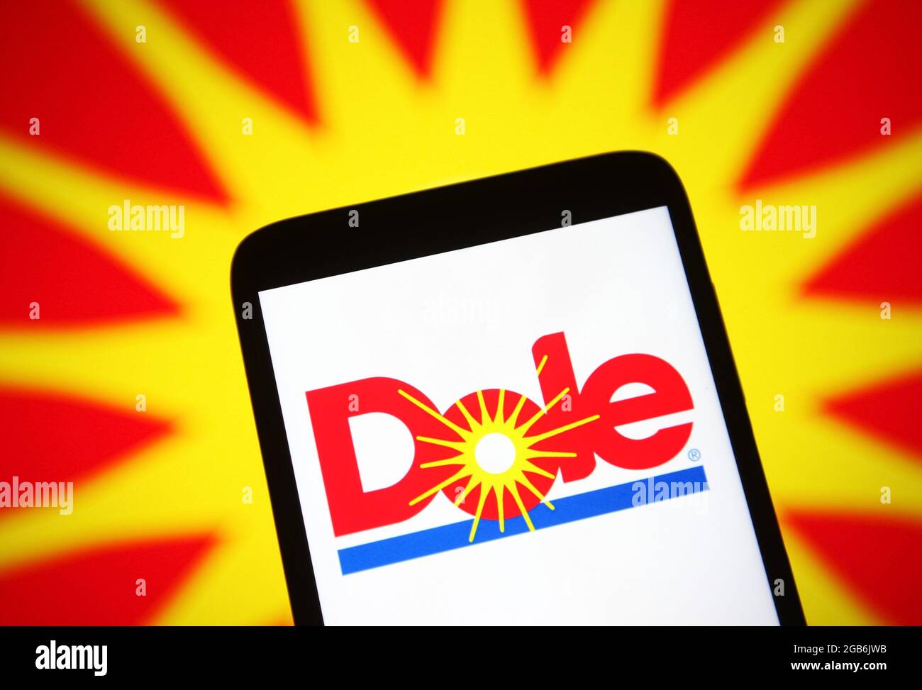 In this photo illustration, Dole plc logo seen displayed on a ...