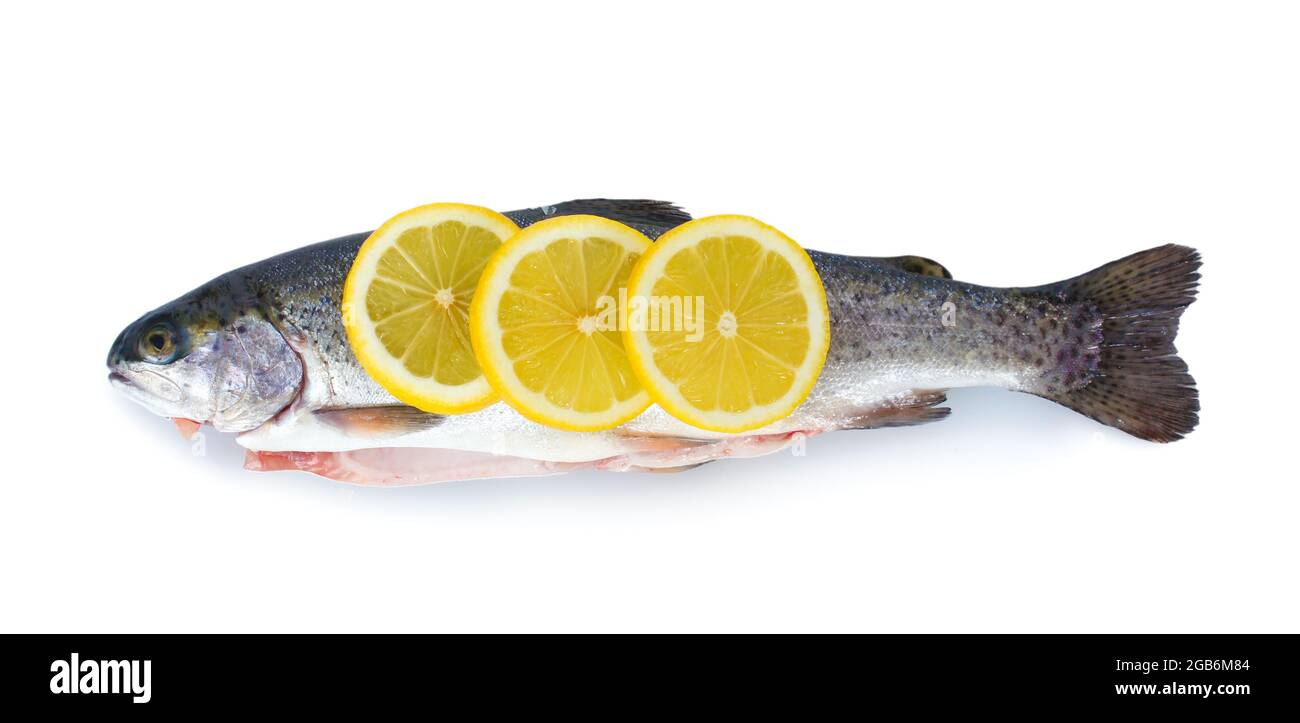 Fresh fish with lemon isolated on white Stock Photo - Alamy