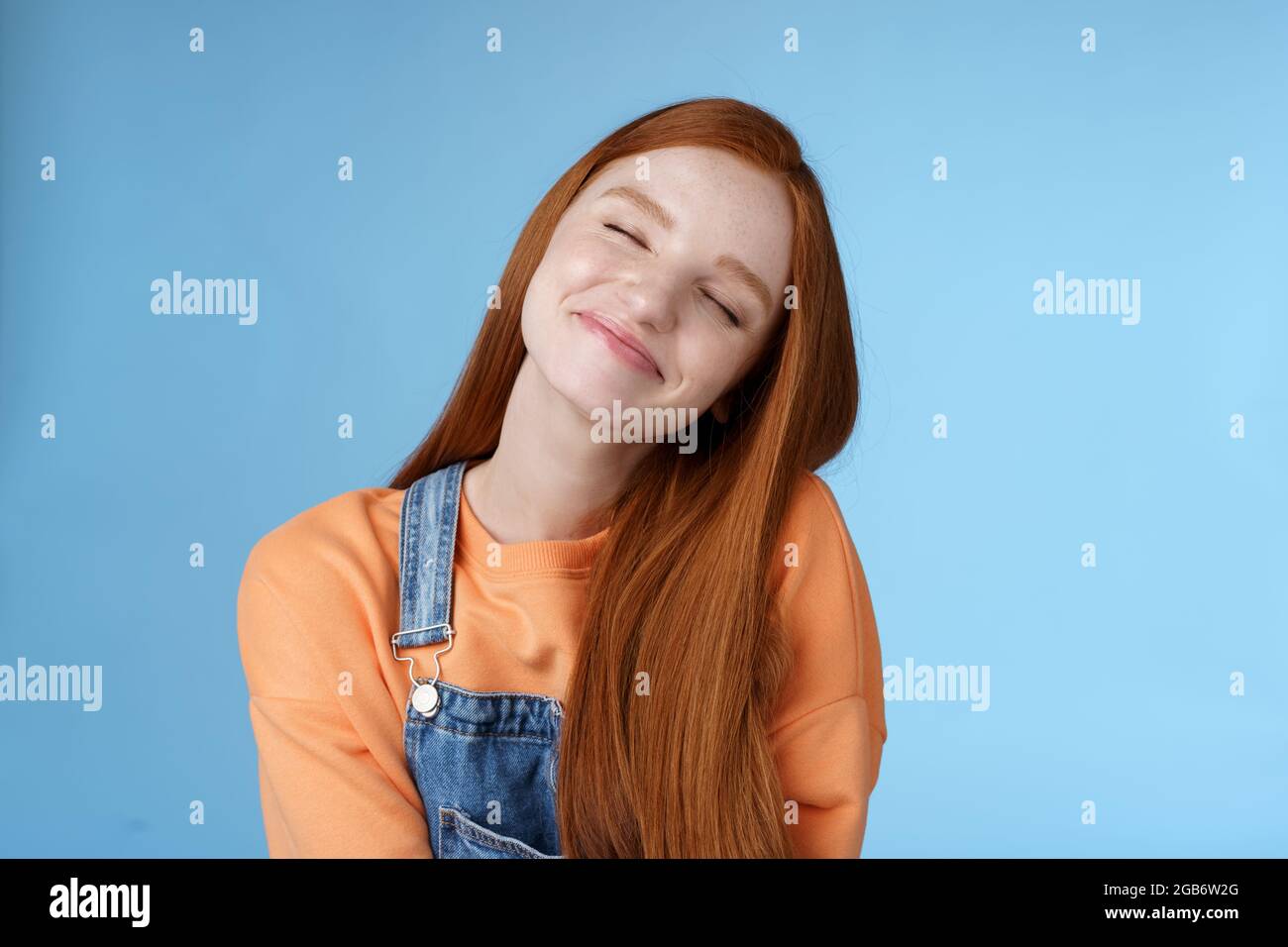 Dreamy kind silly redhead smiling happy girl straight long ginger hair ...