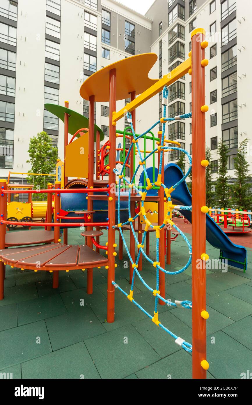 beautiful playground in the residential building Stock Photo - Alamy