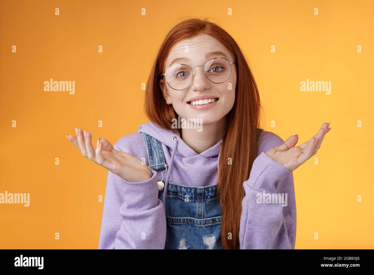 Well no big deal. Attractive silly redhead hipster girl wearing glasses ...