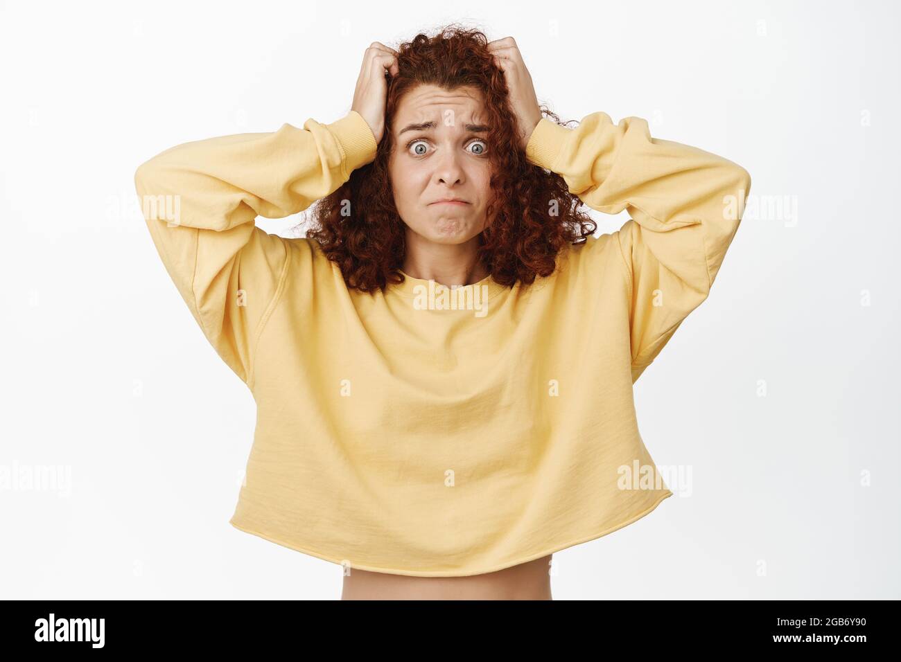 Freak out redhead girl looking distressed, having big mindblowing ...