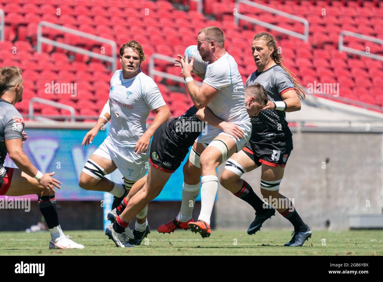 LA Giltinis flanker Angus Cottrell (6) is tackled by Rugby ATL flanker ...