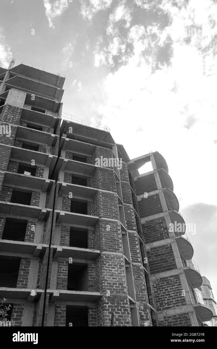 Black and white photo of a multi-storey residential building under ...