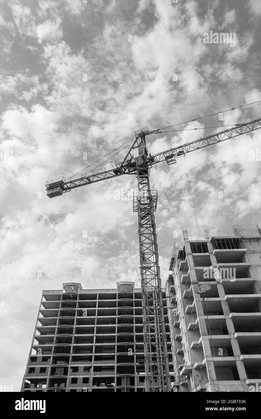 Black and white photo of a multi-storey residential building under ...