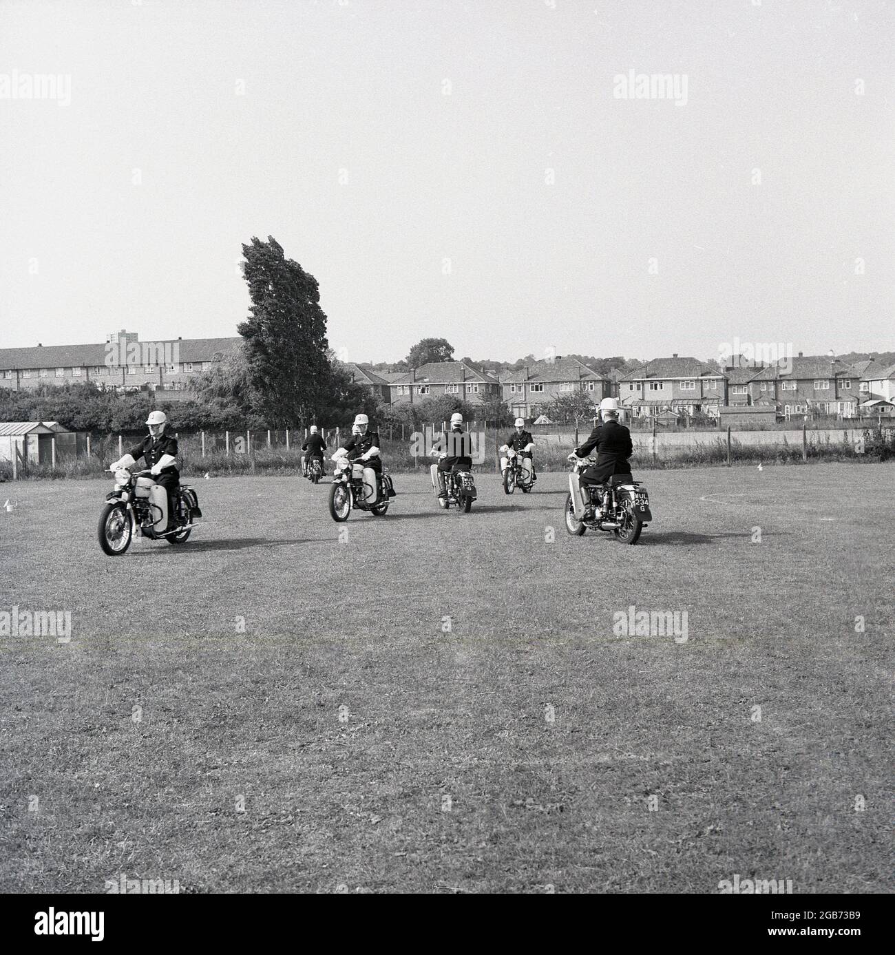 1969, historical, a motorcycle display team doing a demonstration at ...