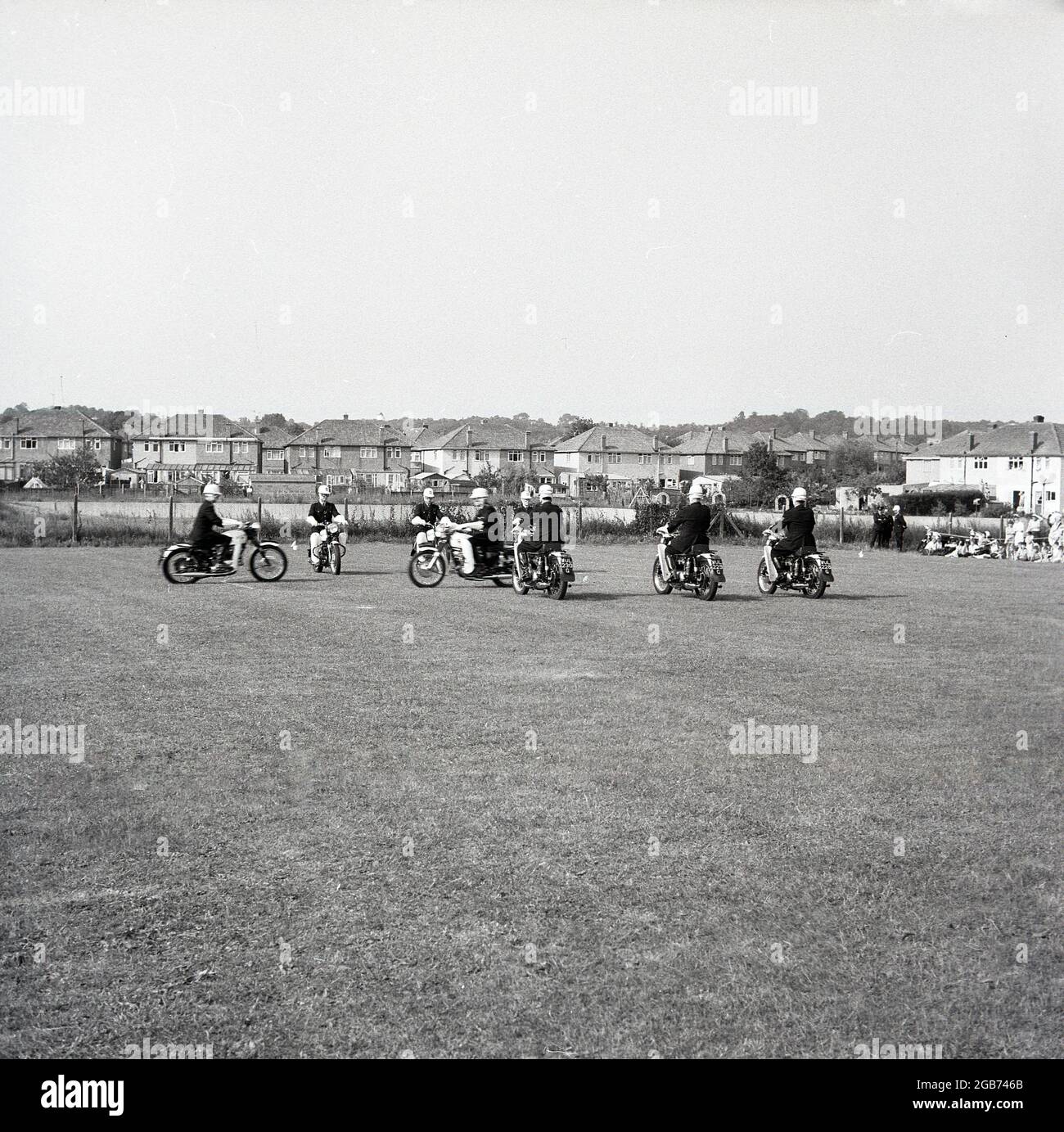 1969, historical, a motorcycle display team doing a demonstration at ...