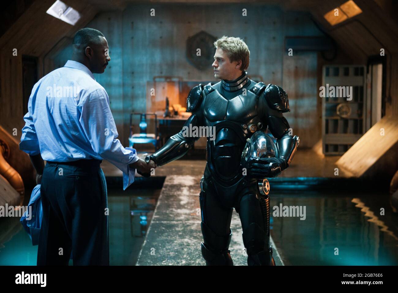 Los Angeles. CA.USA. Idris Elba and Charlie Hunnam in a scene from the ...