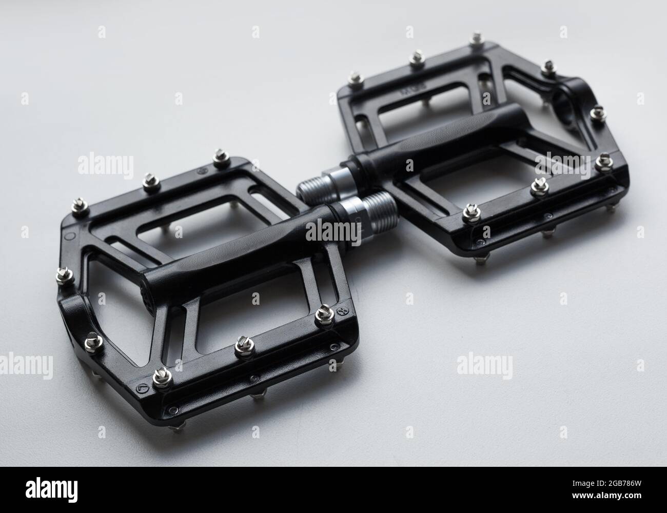 mountain bike pedals on an isolated white background Stock Photo - Alamy