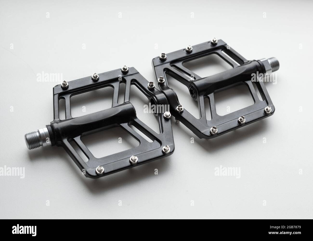 mountain bike pedals on an isolated white background Stock Photo - Alamy