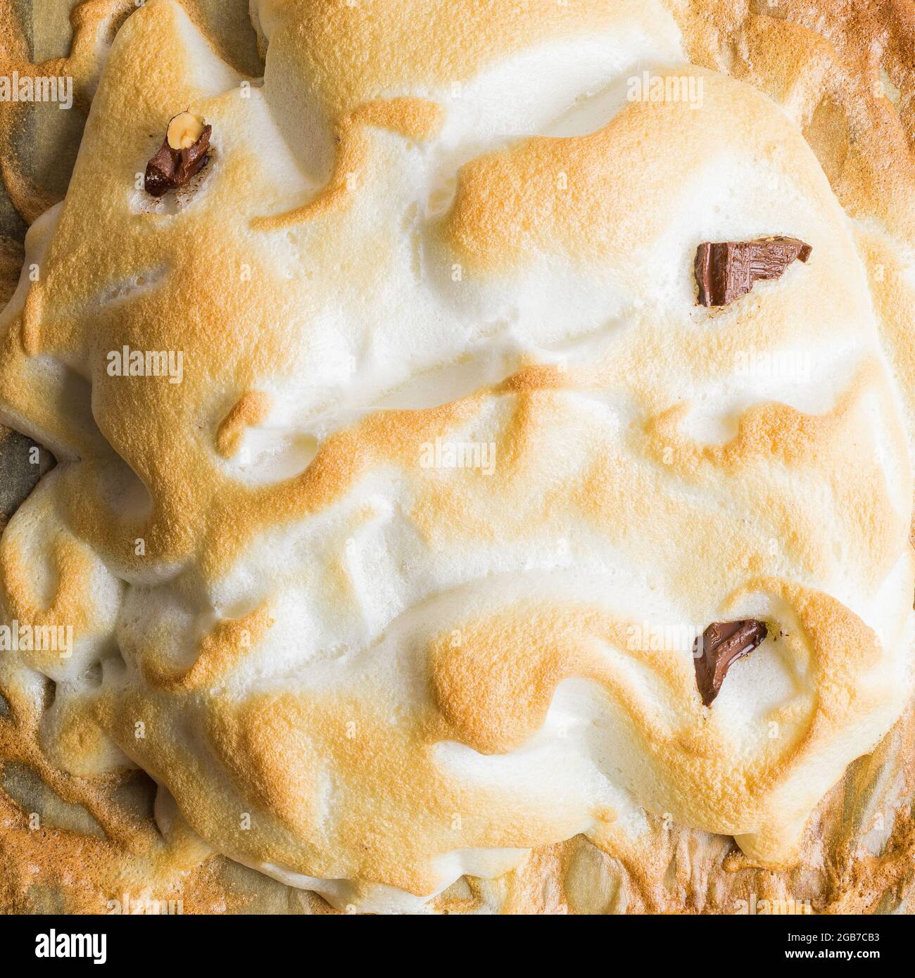 Baked egg whites whipped cream with chocolate, nutmeg. Layout. View ...