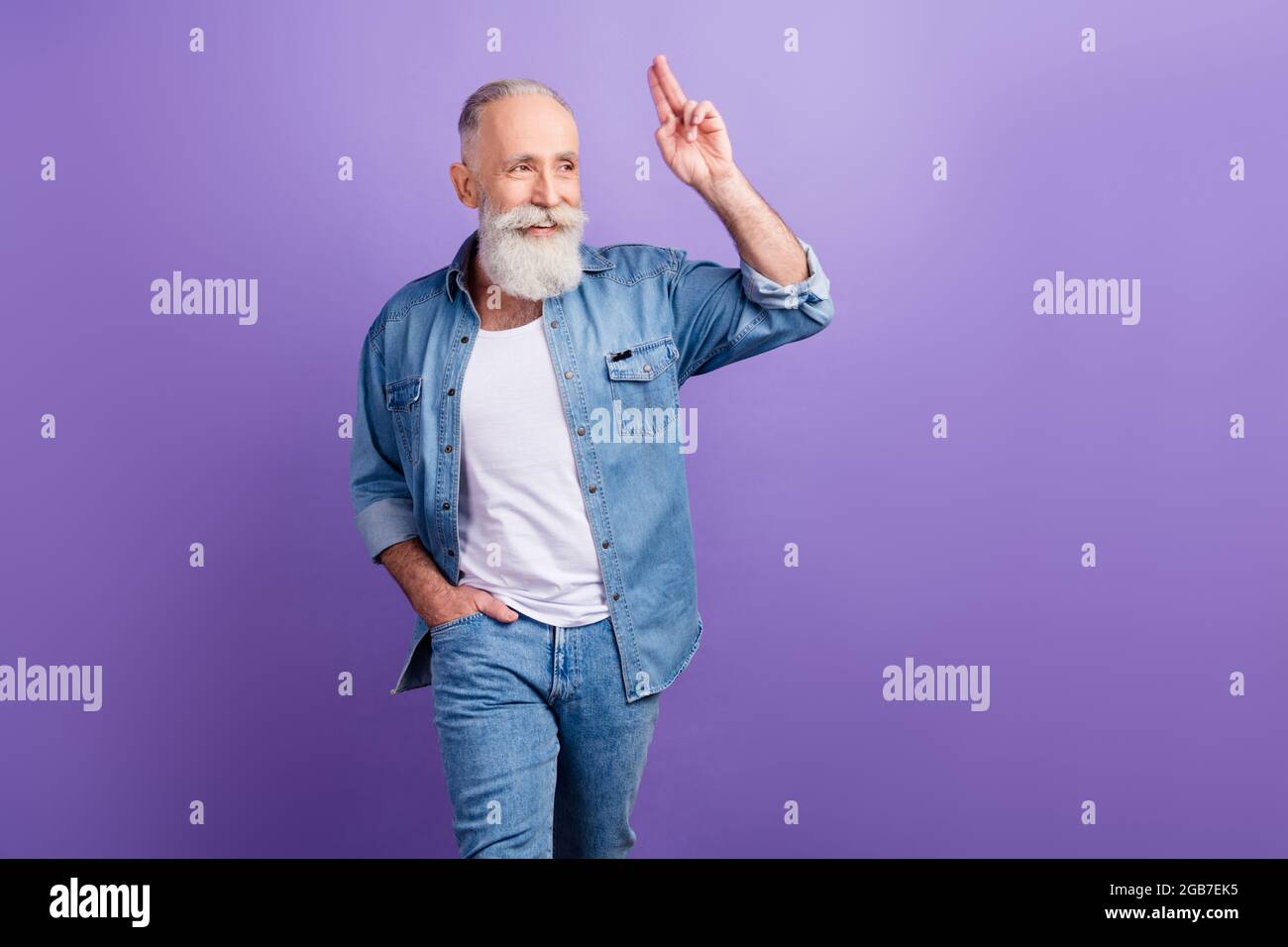 Photo of elderly man happy positive smile show fingers hello salute ...