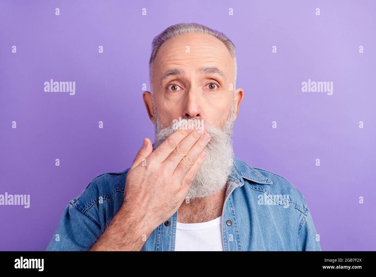 Photo of aged man close cover lips hand oops fail mistake tell secret ...