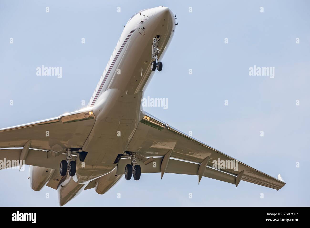photograph of an airplane few seconds before landing Stock Photo - Alamy