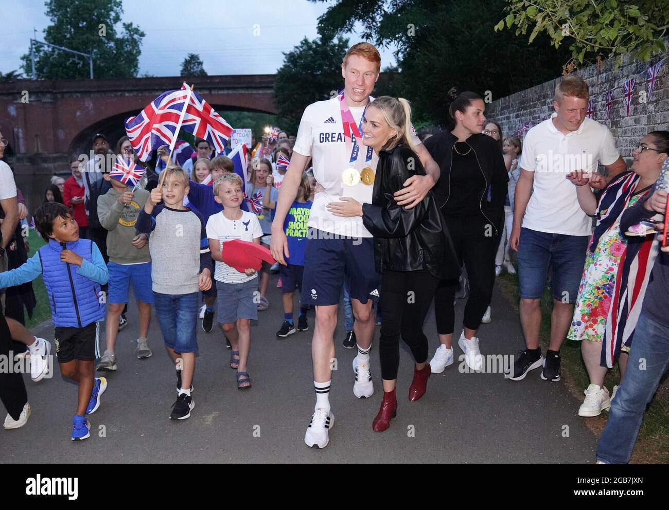 RETRANSMITING ADDING NAME British swimmer Tom Dean, with his girlfriend ...