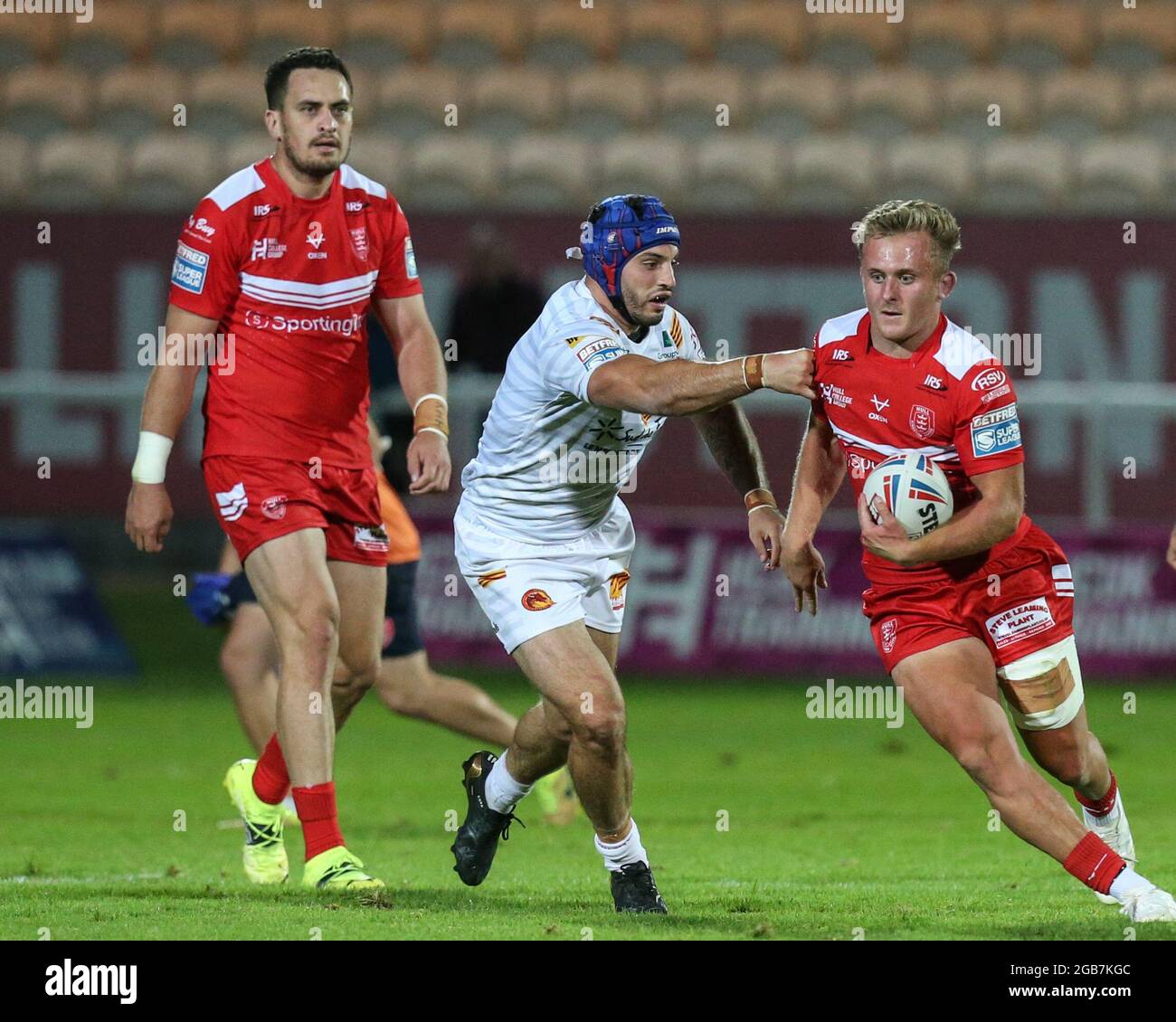 Jez Litten (14) of Hull KR runs with the ball Stock Photo - Alamy