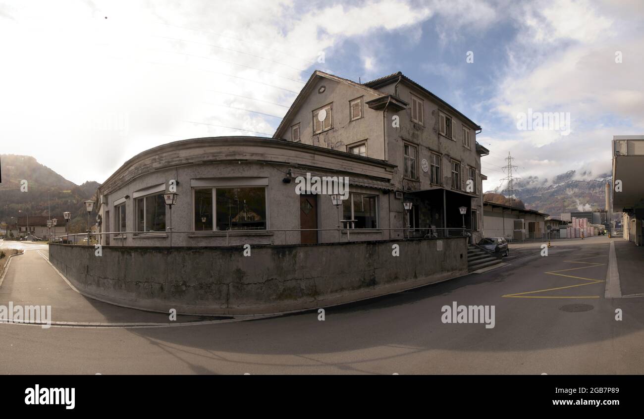 Run-down hotel building by the railway station in Flums, Switzerland ...