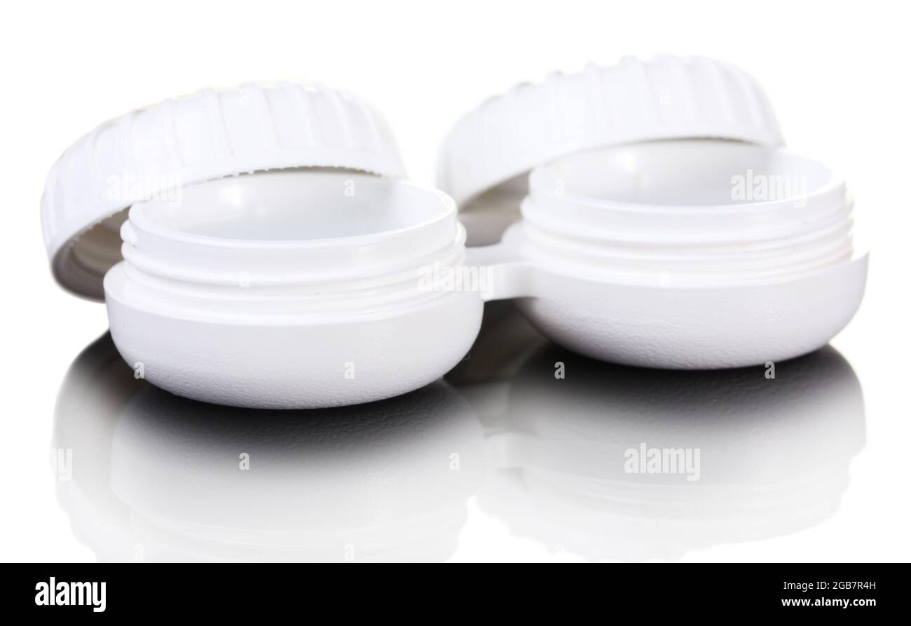 contact lenses in containers on grey background Stock Photo - Alamy