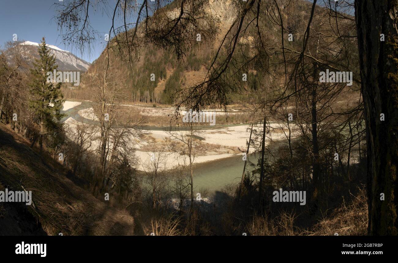 Stretch of the Grisonian Alpine Rhine river at Rhäzuns, showing shingle ...