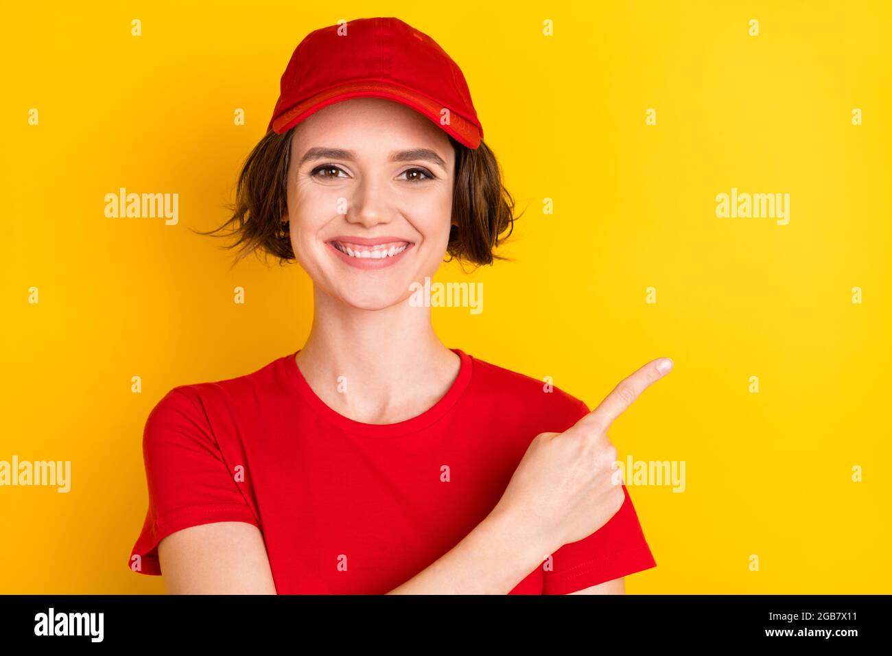 Photo of nice optimistic brown hair lady point empty space wear t-shirt ...