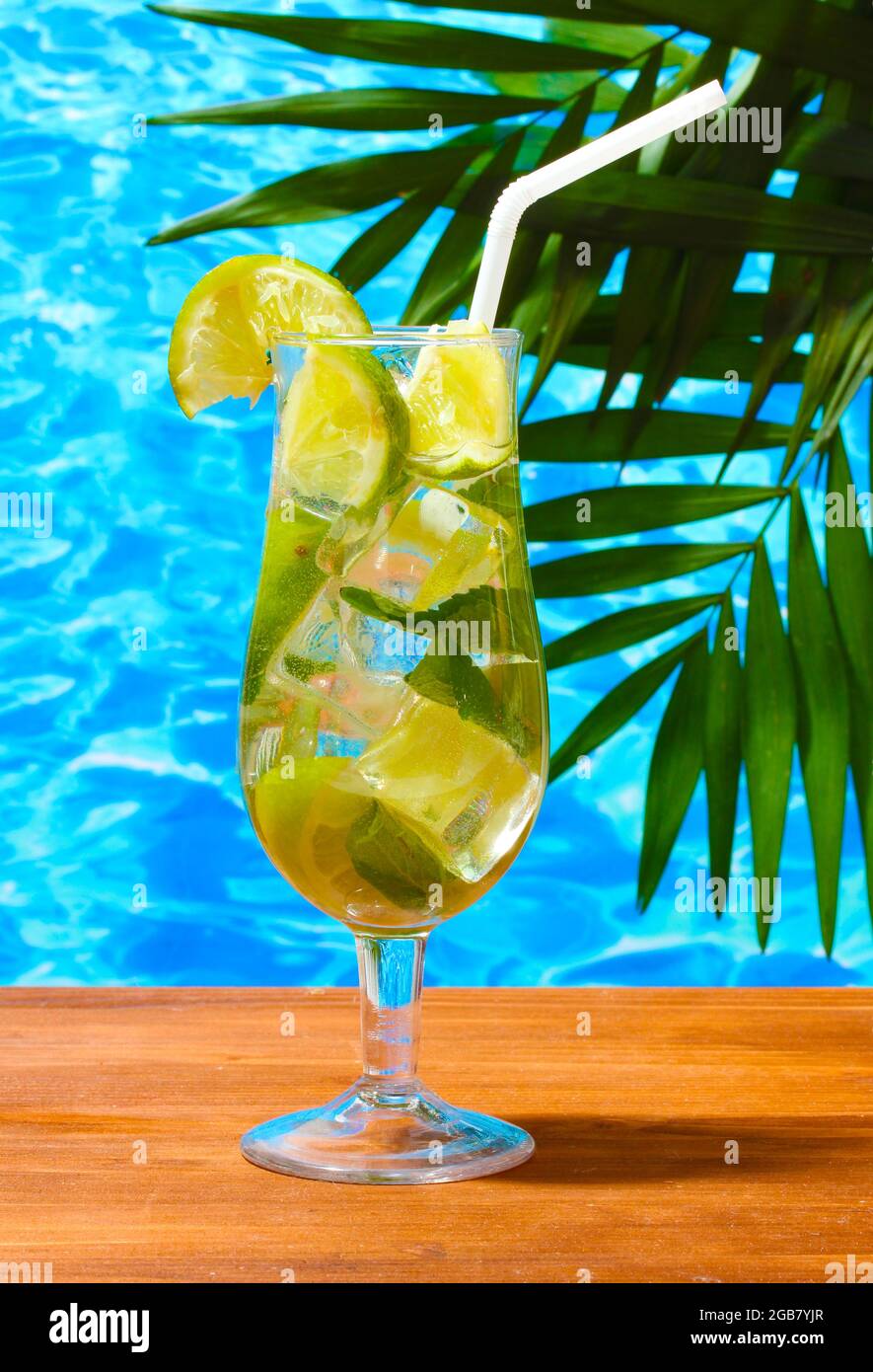 cold fresh lemonade on wooden table on sea background Stock Photo - Alamy