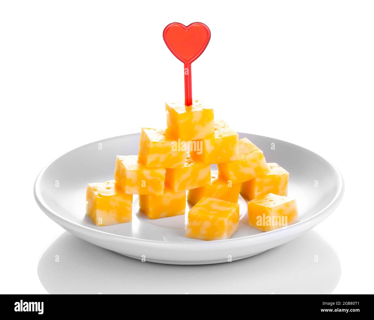 Cheese pyramid on plate isolated on white Stock Photo - Alamy