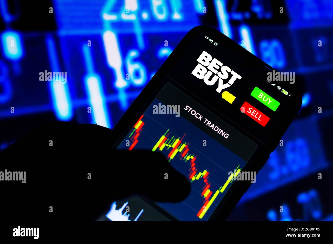 In this photo illustration the stock trading graph of Best Buy seen on ...