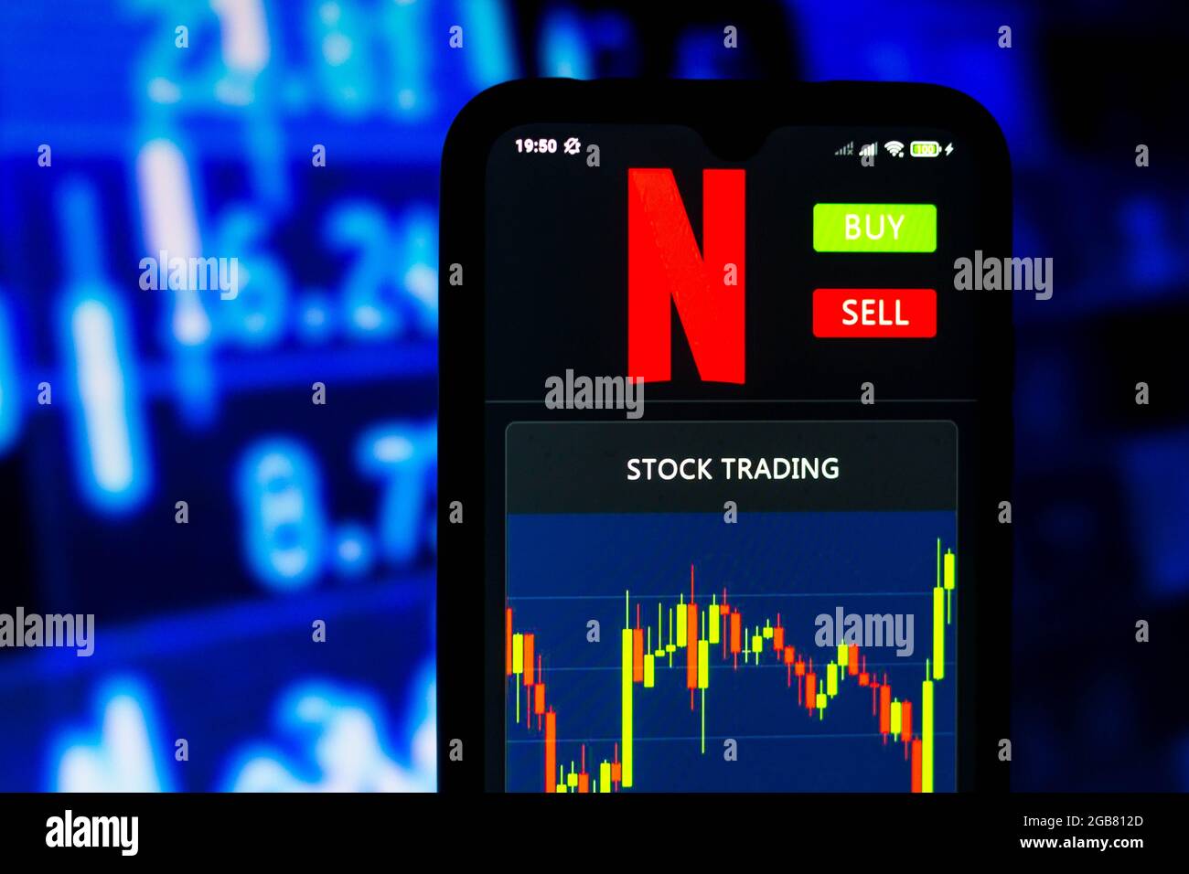 In this photo illustration the stock trading graph of Netflix seen on a ...
