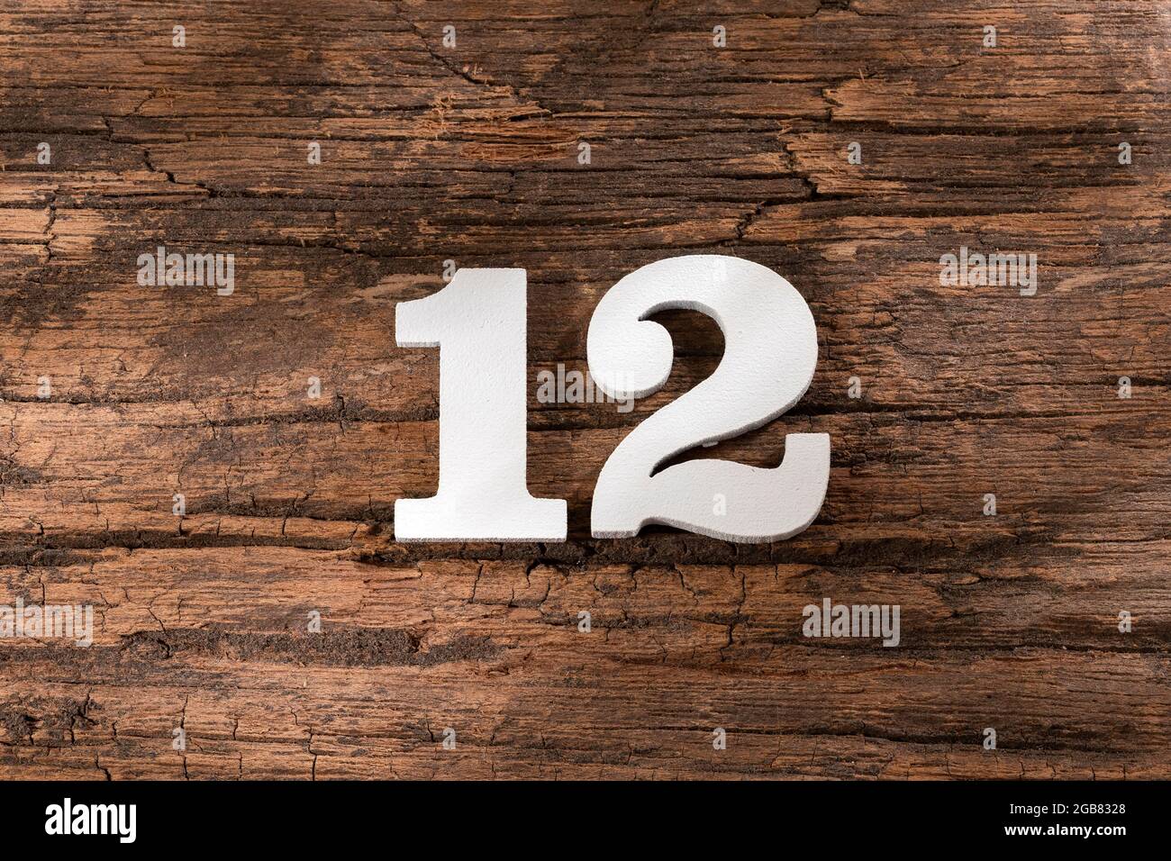 twelve 12 - White wooden number on rustic background Stock Photo - Alamy