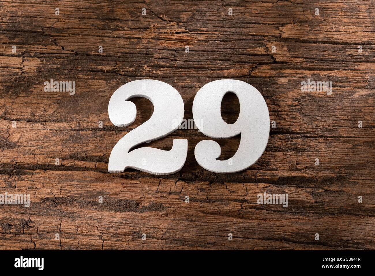 twenty nine 29 - White wooden number on rustic background Stock Photo ...