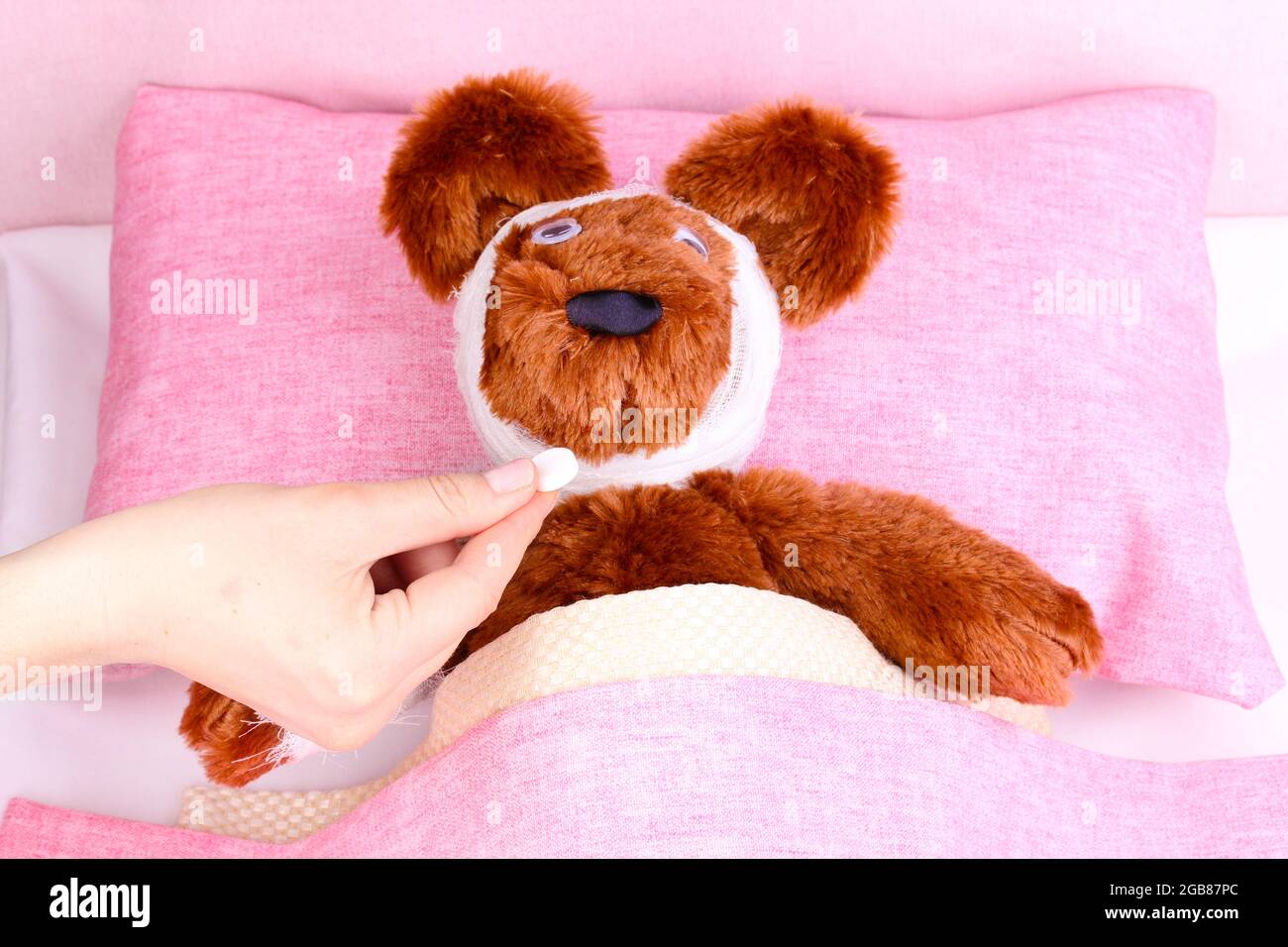 Sick bear in bed Stock Photo - Alamy