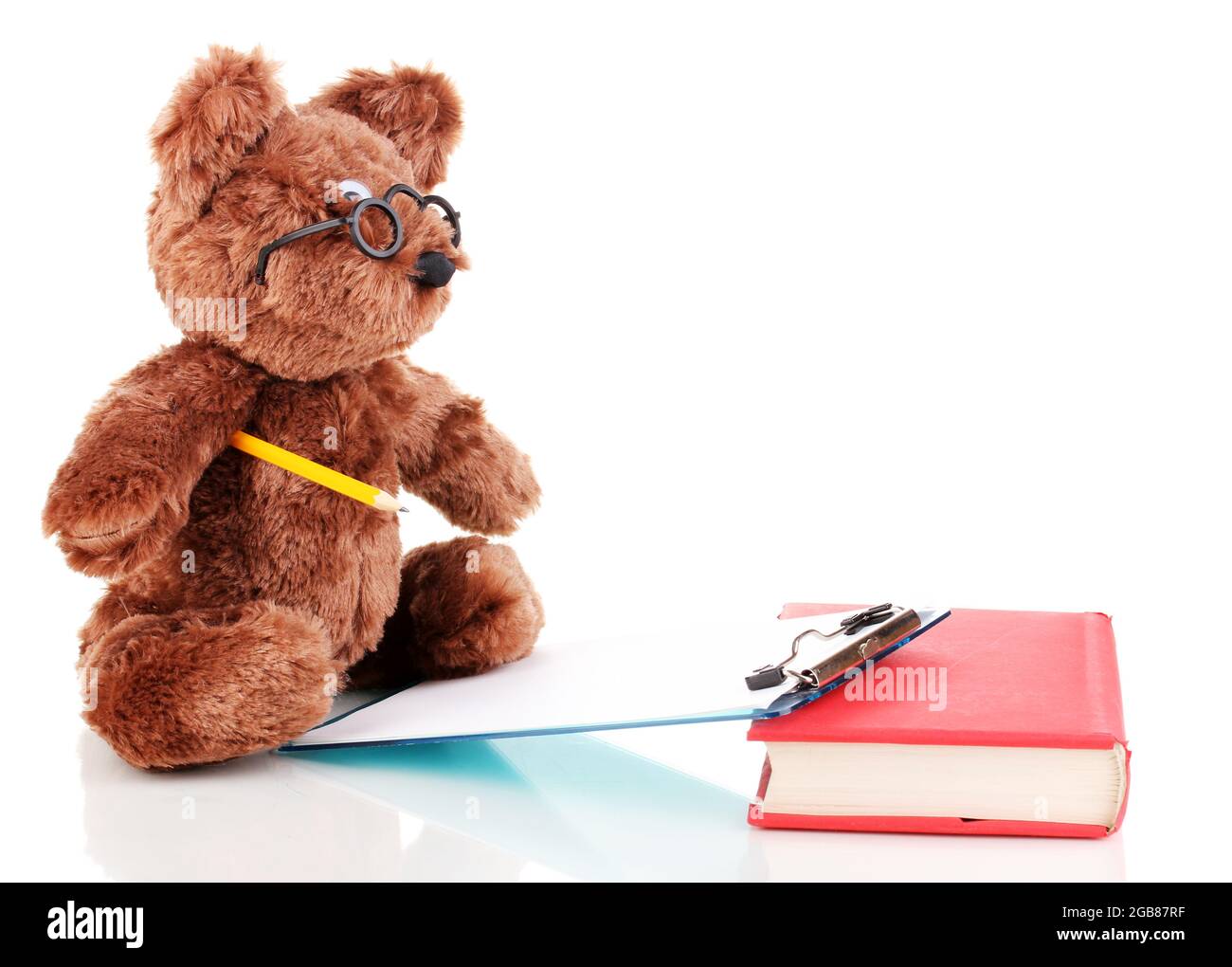 Bear toy writing something isolated on white Stock Photo - Alamy