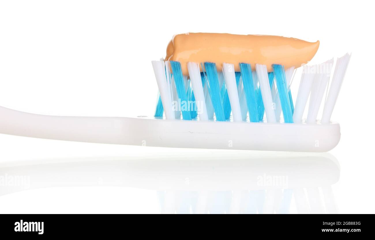Toothbrush with paste isolated on white Stock Photo - Alamy