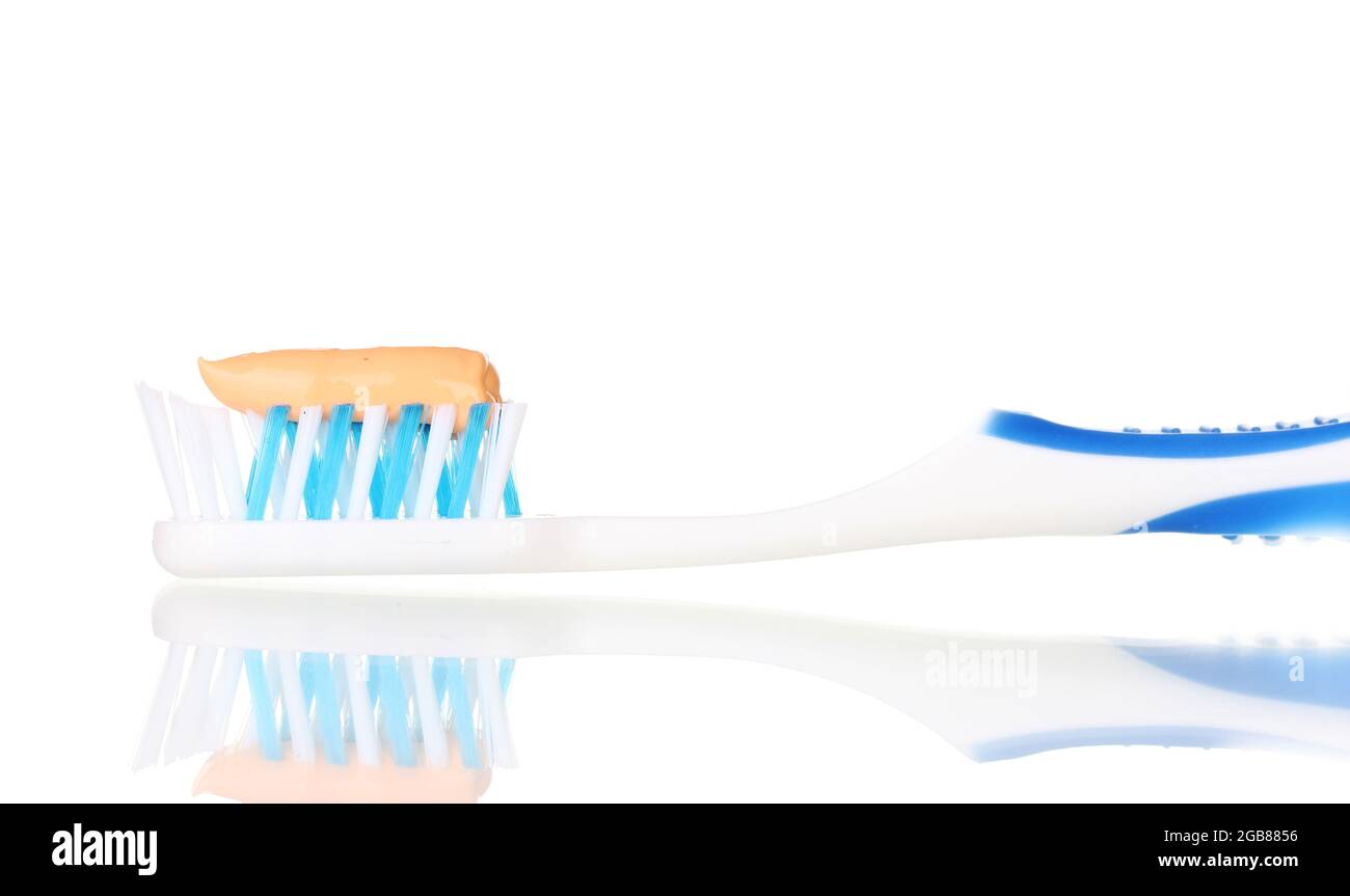 Toothbrush with paste isolated on white Stock Photo - Alamy