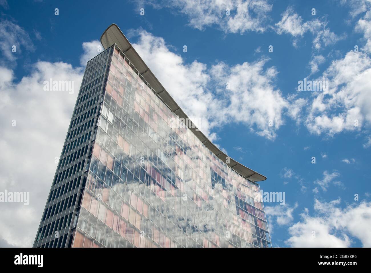 Apartment building blue sky clouds hi-res stock photography and images ...