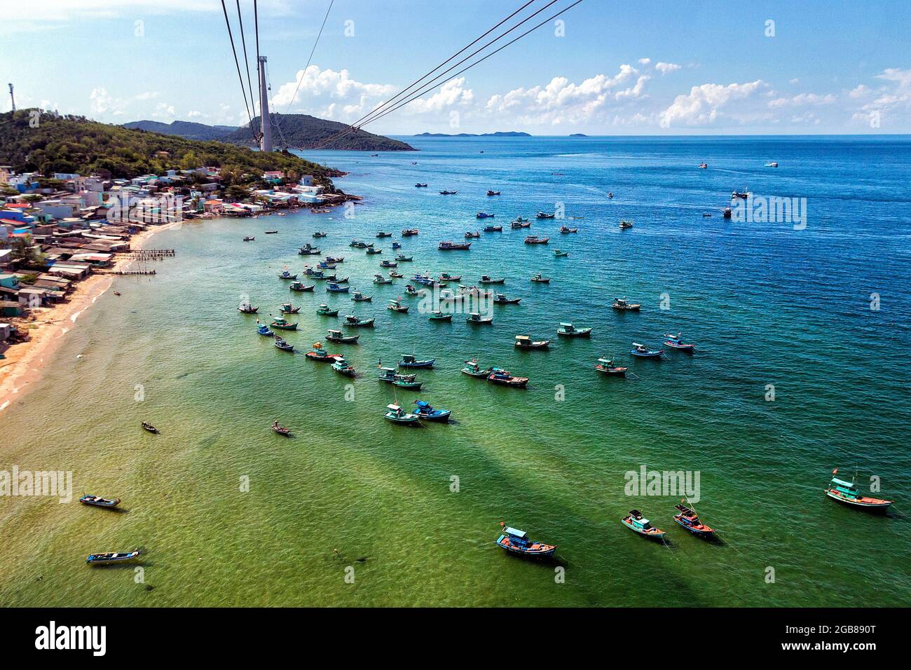 in cable car over village and boats in vietnam Stock Photo - Alamy