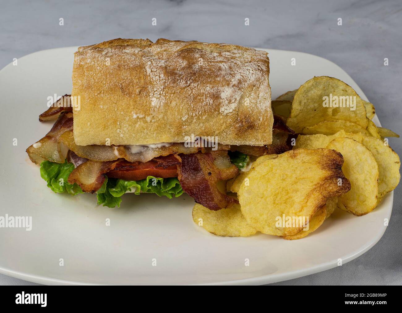 bacon lettuce and tomato on a ciabatta bread with mayo Stock Photo - Alamy