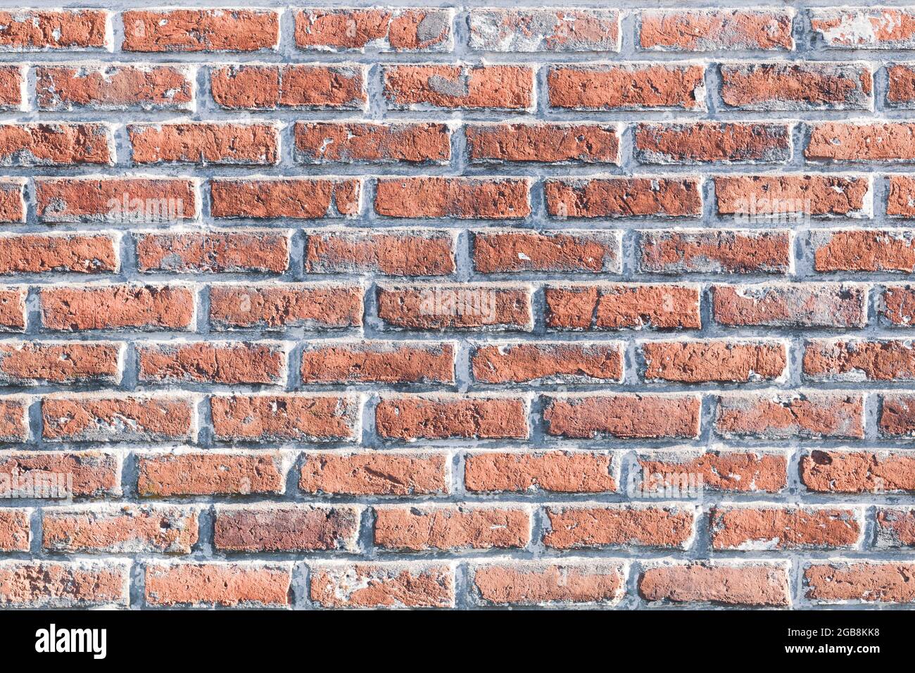 Red weathered stained brick wall. Background texture Stock Photo - Alamy