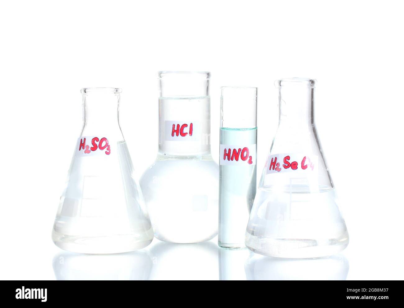 Test-tubes with various acids isolated on white Stock Photo - Alamy