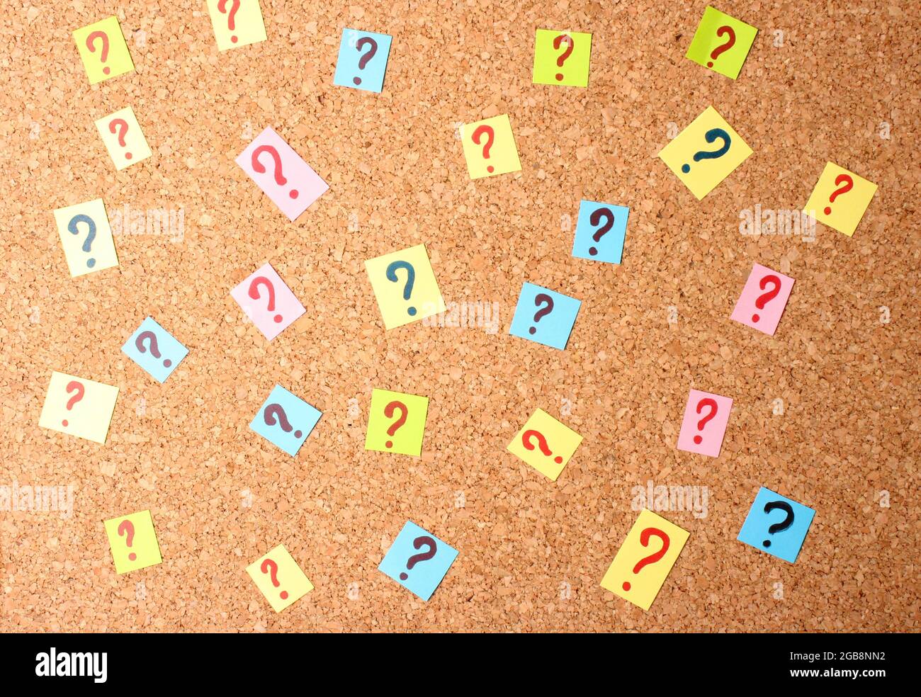 Many question marks on cork board Stock Photo - Alamy