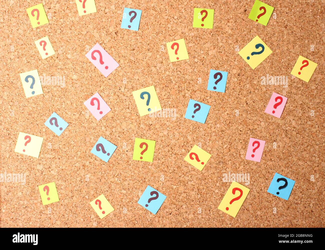 Many question marks on cork board Stock Photo - Alamy