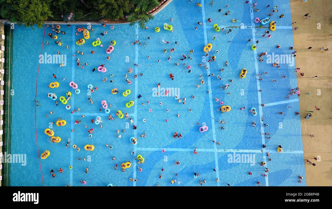 SUZHOU, CHINA - JULY 31, 2021 - Aerial photo shows tourists visiting a ...