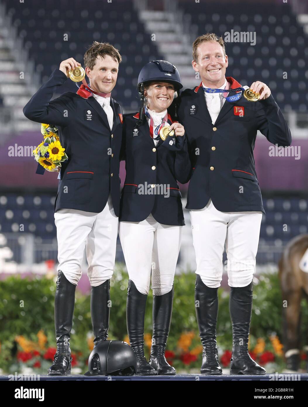 Oliver Townend (R), Laura Collett (C) and Tom McEwen of Britain pose ...