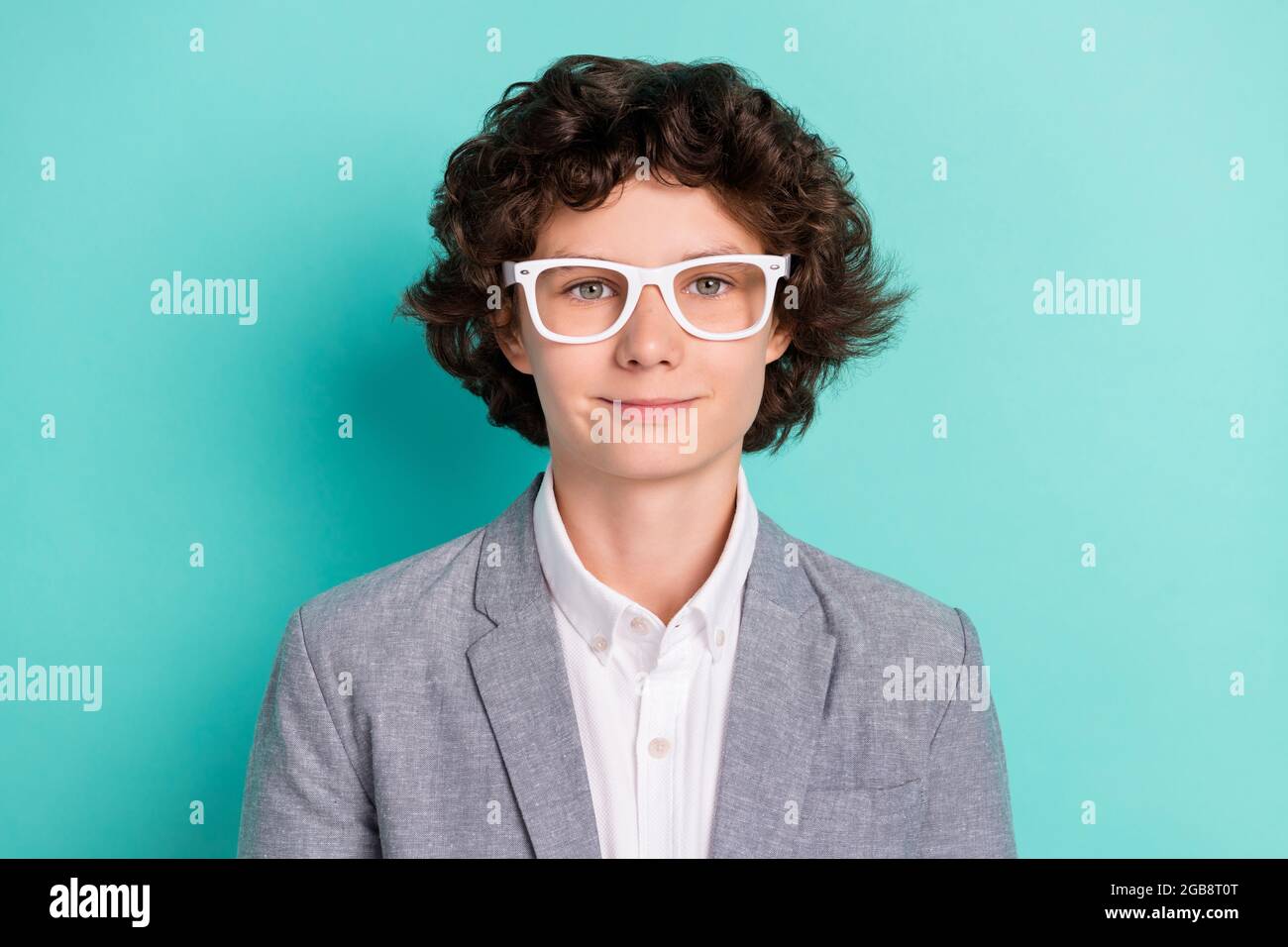 Photo of pretty adorable school boy wear grey jacket spectacles smiling ...