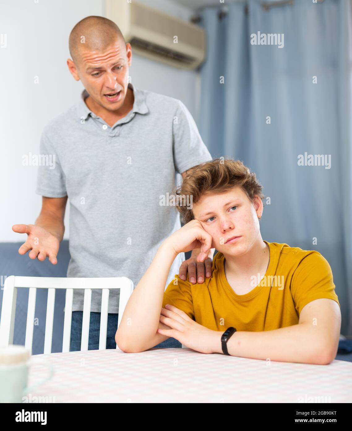 Dad shouting at his son Stock Photo - Alamy
