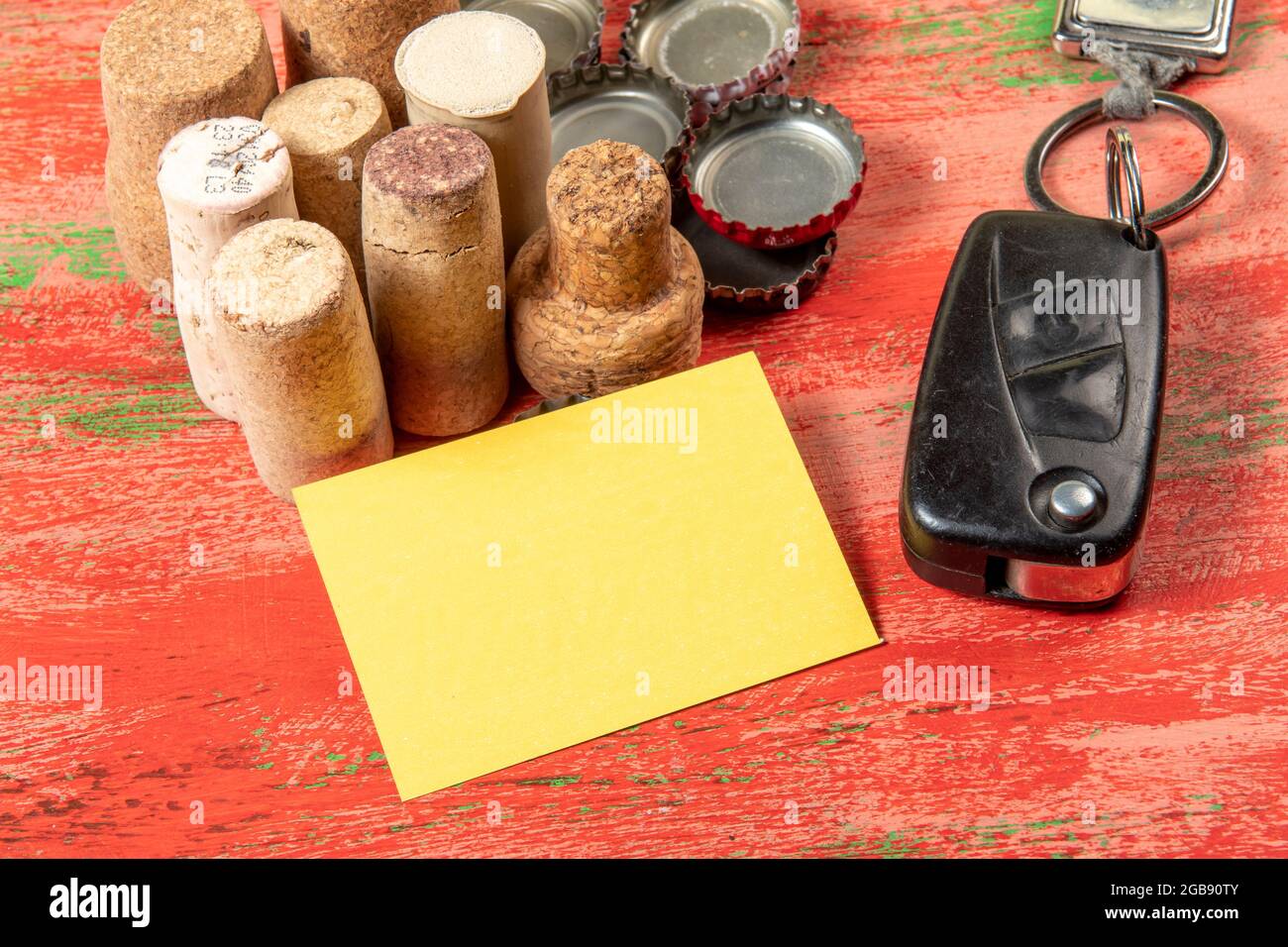 alcohol abuse and danger in car driving symbolized by key and cork ...