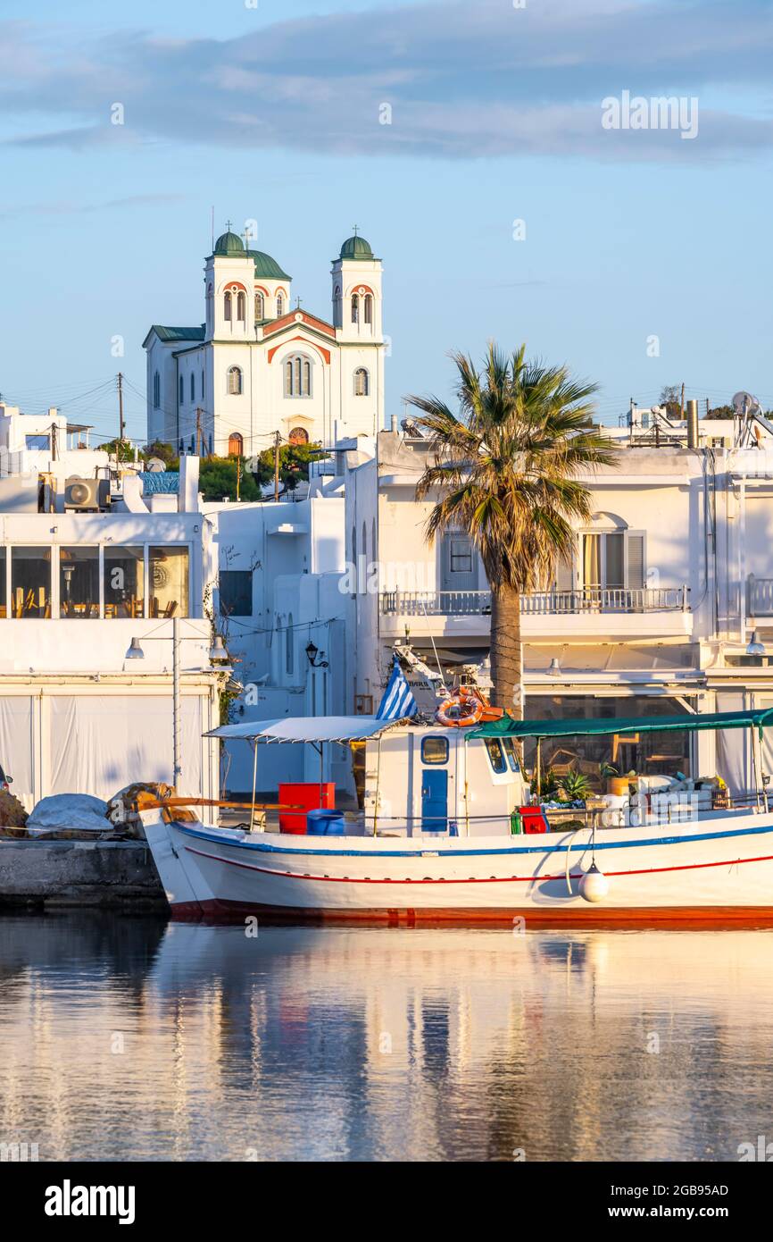 Harbour with fishing boat, Naoussa harbour town with church, Paros ...