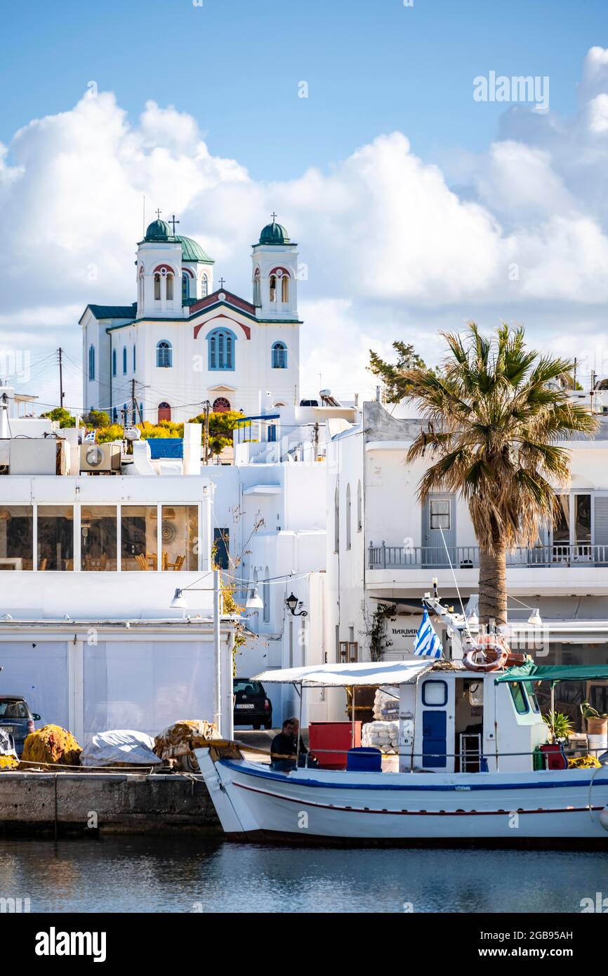 Harbour with fishing boat, Naoussa harbour town with church, Paros ...