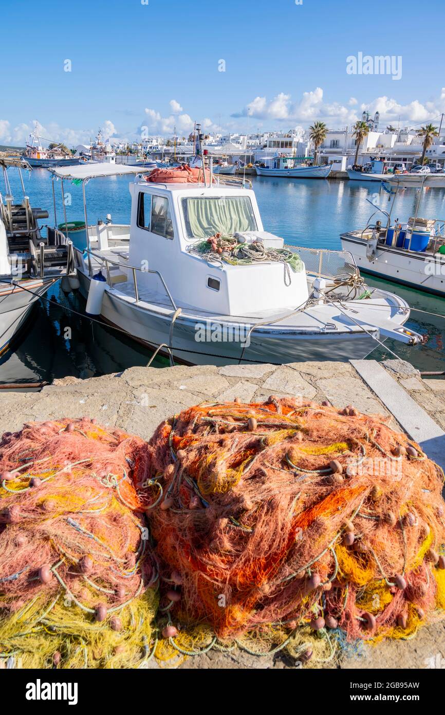 Harbour with fishing boat and nets, Naoussa harbour town, Paros Island ...